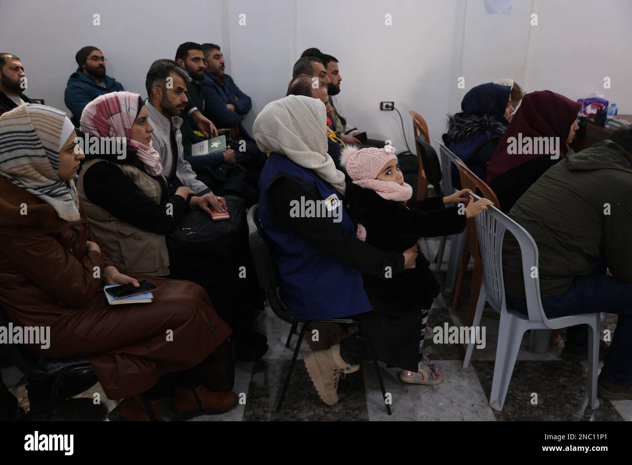 Sarmada, Syria. 14th Feb, 2023. Members of civil society organizations ...