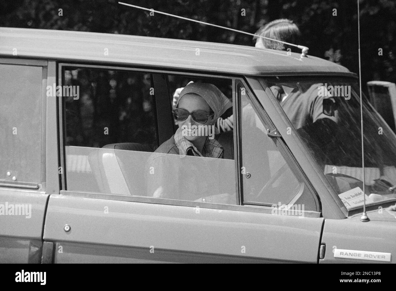 Princess Anne is driving a Range Rover while her husband Mark Phillips ...