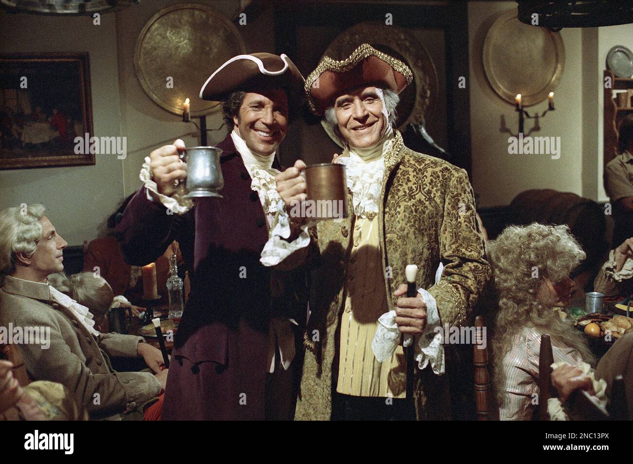 Actor and singer Tom Jones, left with Ricardo Montalban raise their ...