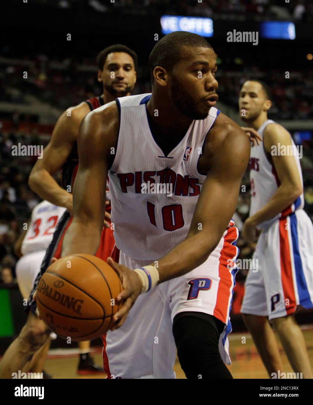 Detroit Pistons forward Greg Monroe (10) pulls down a rebound against ...