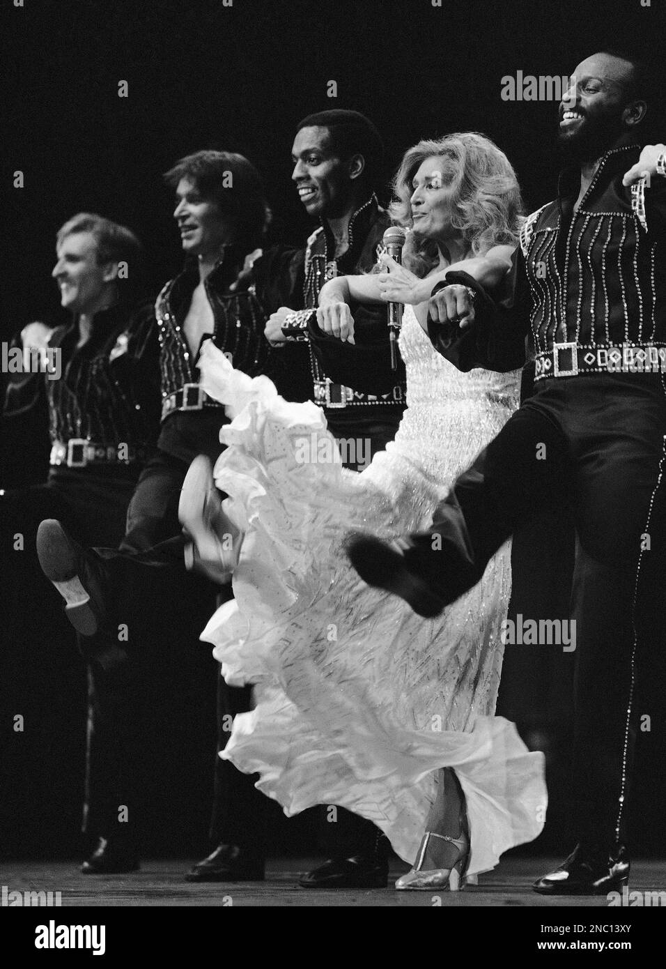 French singer Dalida performs with dancers on January 6, 1980 at the ...