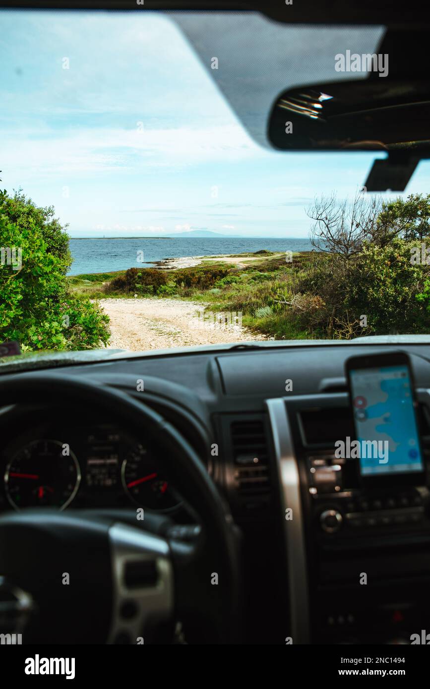view from car front windshield at sea beach Stock Photo - Alamy