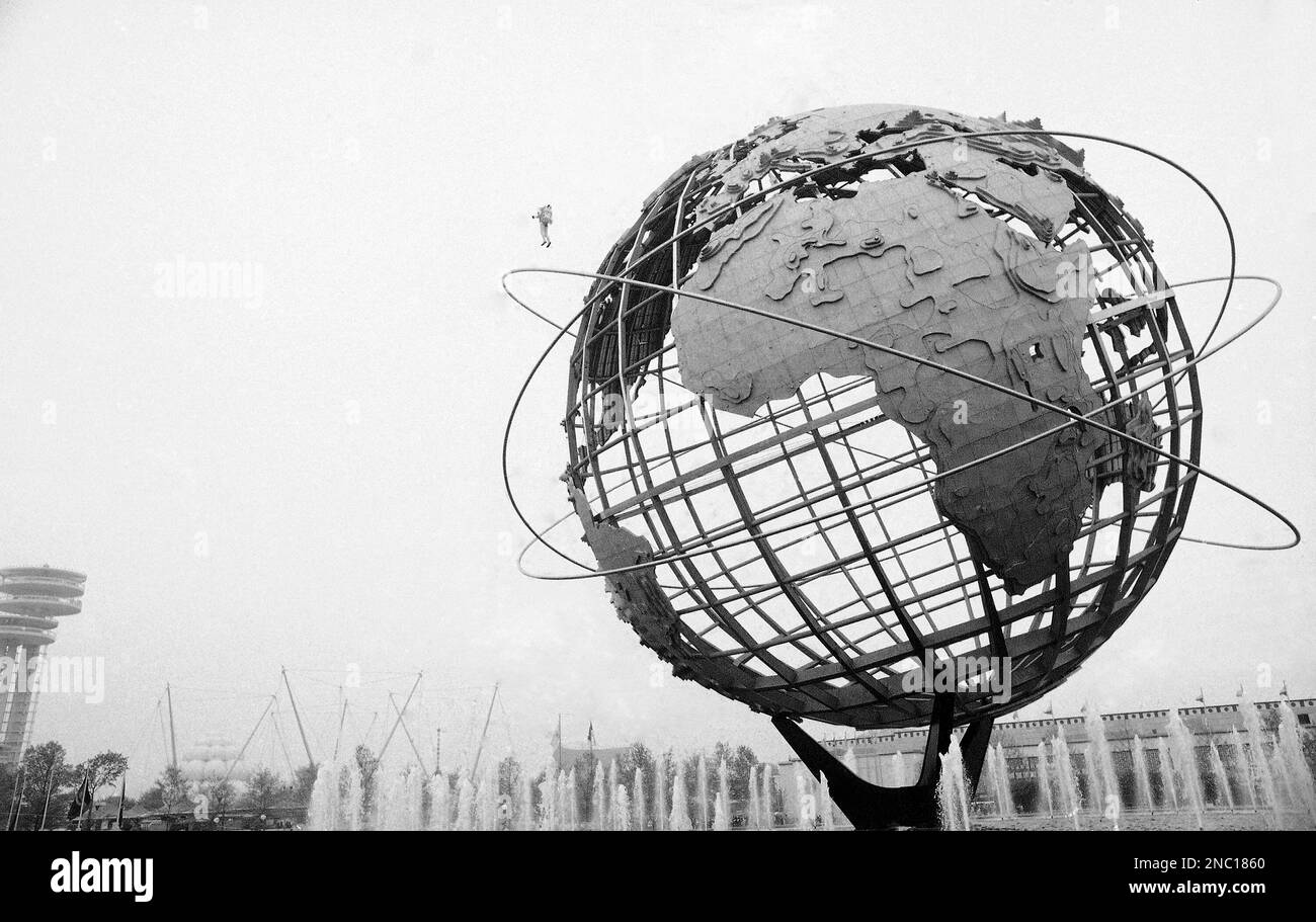 Performer Robert Courter flies past the 13-story-high Unisphere at the ...