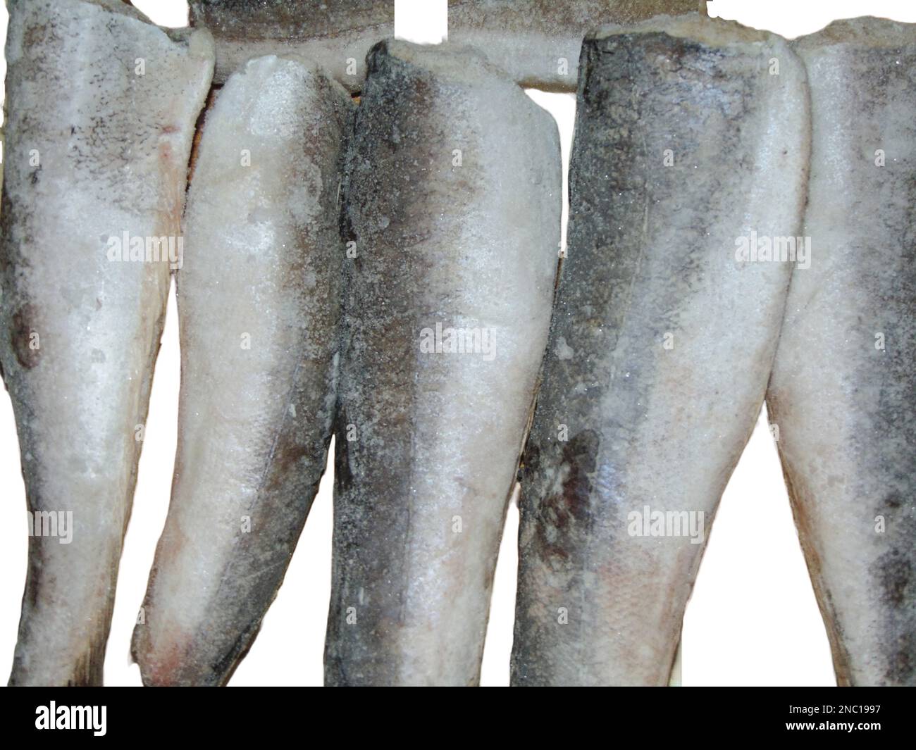 Pieces of hake fish taken out of the freezer Stock Photo - Alamy