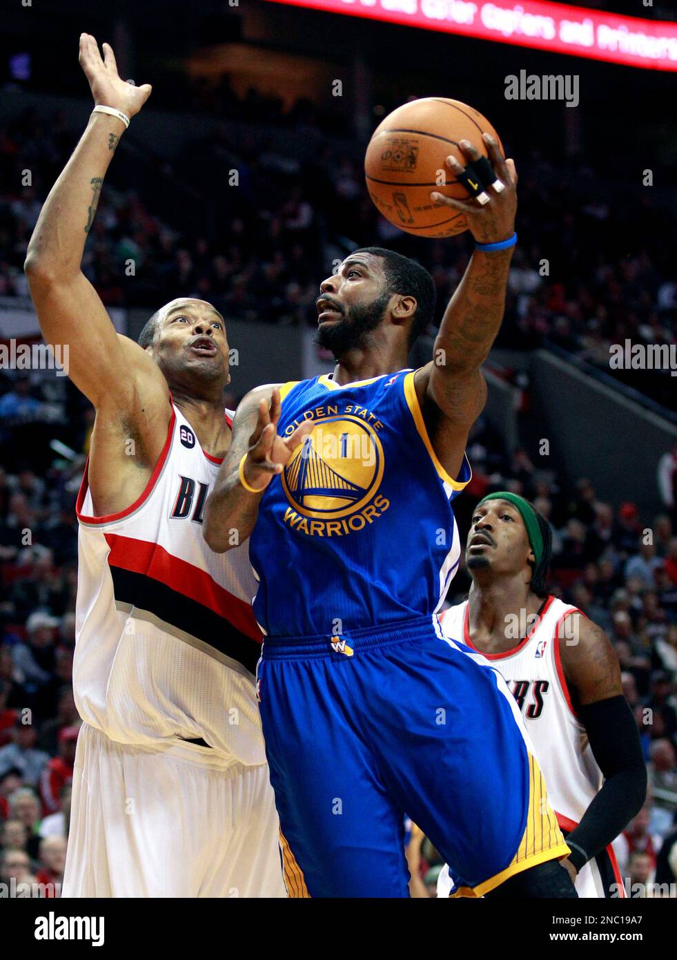 Golden State Warriors' Dorell Wright (1) goes to the basket as Portland ...