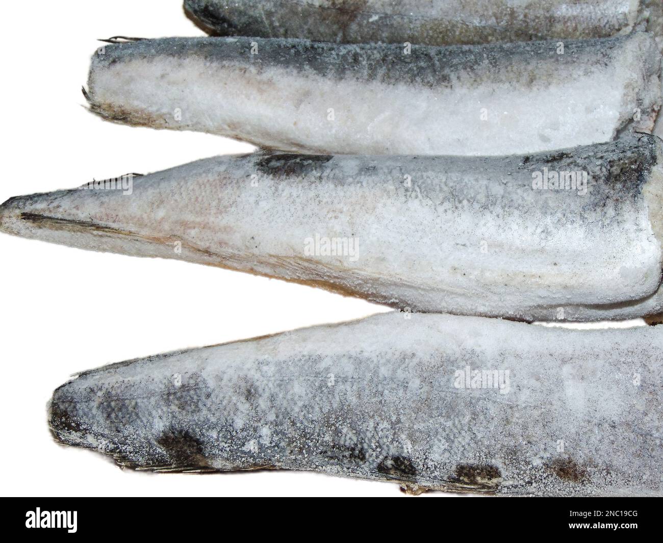 Pieces of hake fish taken out of the freezer Stock Photo - Alamy