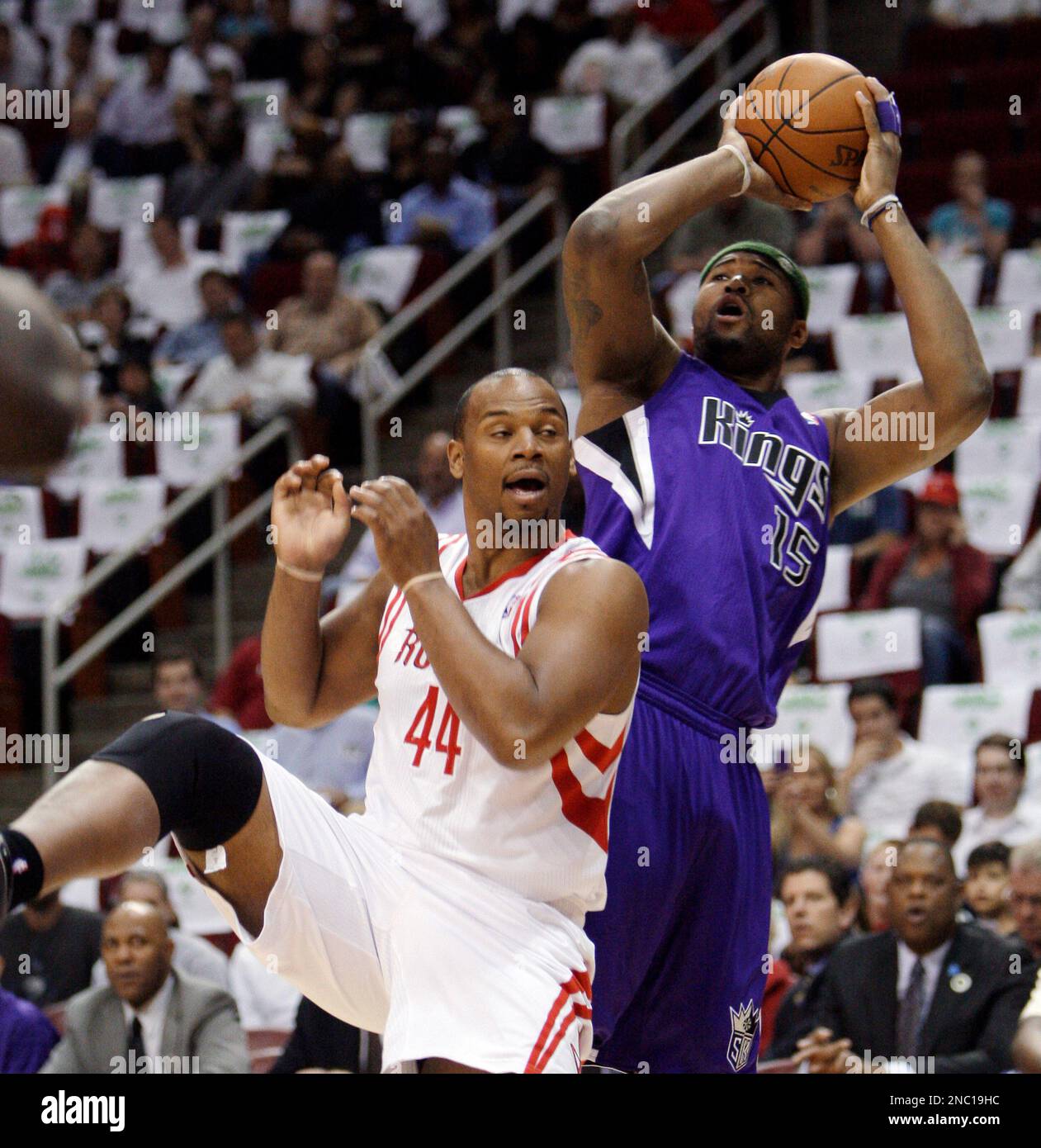 Sacramento Kings forward DeMarcus Cousins (15) is fouled by Houston ...