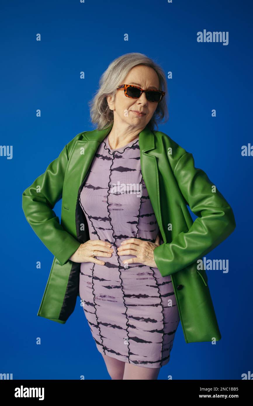 Woman leather jacket hands on hips hi-res stock photography and images ...