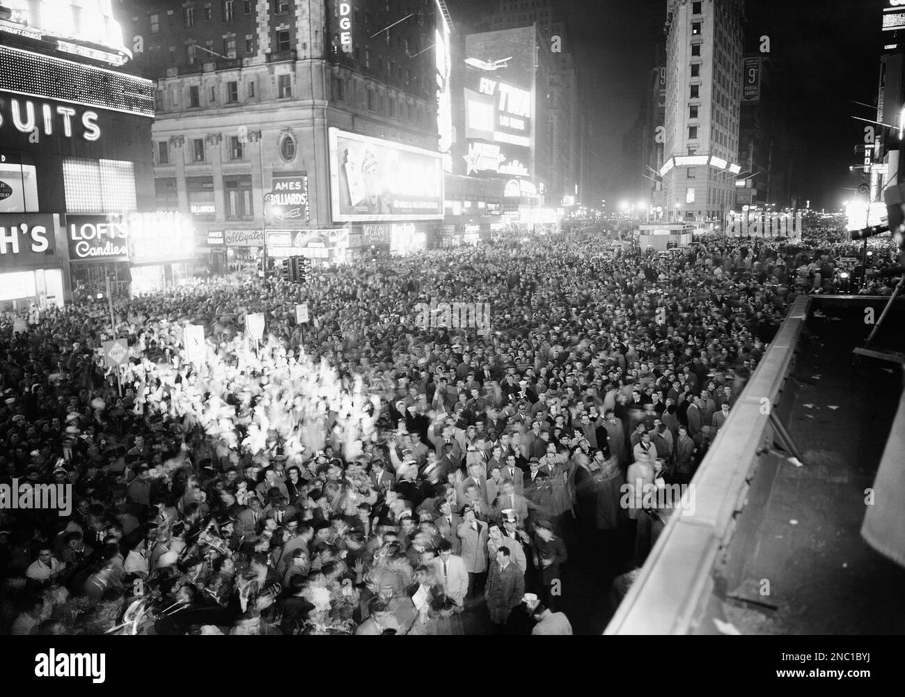 Merrymakers fill New York City’s Times Square before midnight on Dec ...