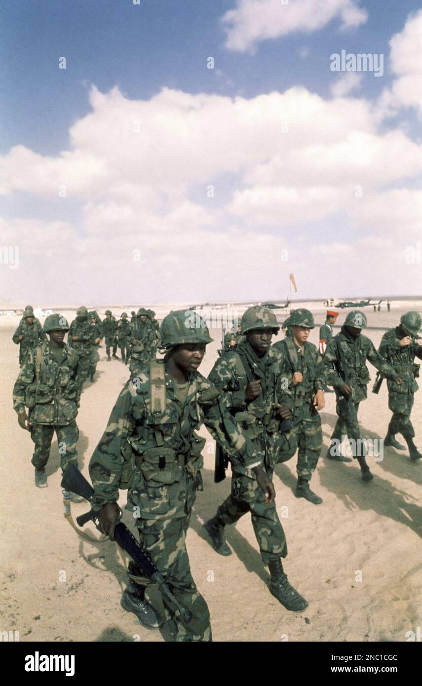 Army soldier weaponry holding walking uniform hi-res stock photography and images - Alamy