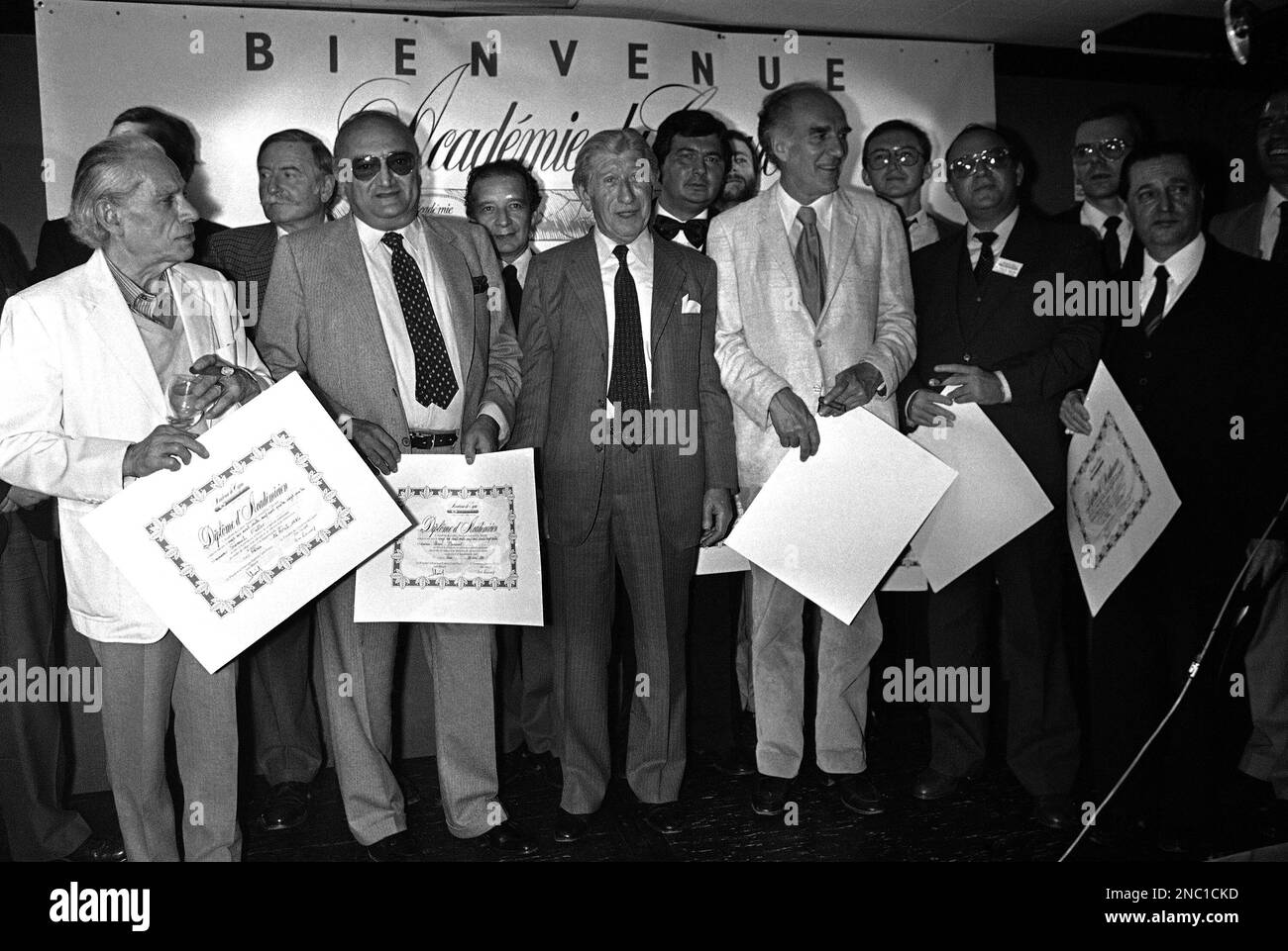 Members of the Cigar Academy pose with their diplomas on April 26, 1984 ...