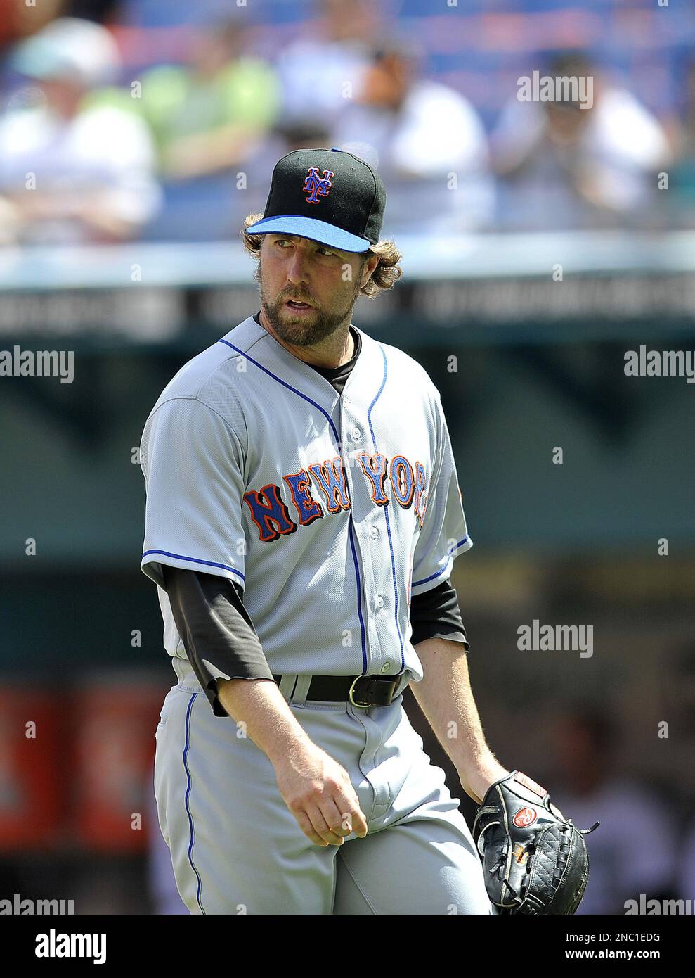 New York Mets starting pitcher R.A. Dickey (43) walks off the field in ...