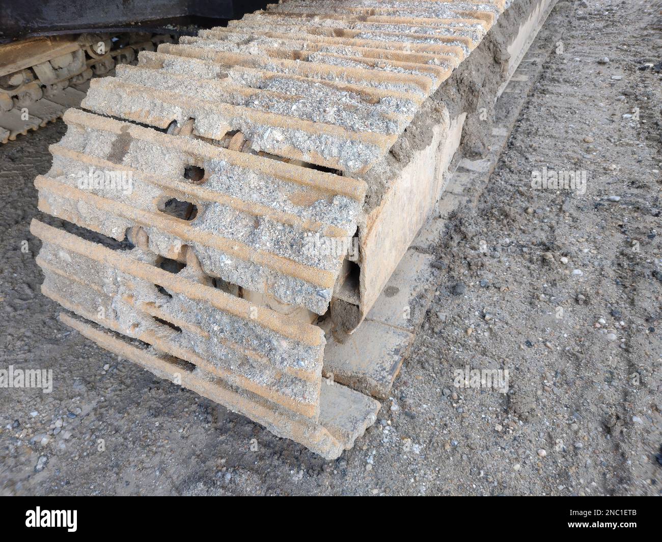 Tracks of an excavator. Big machine Stock Photo - Alamy