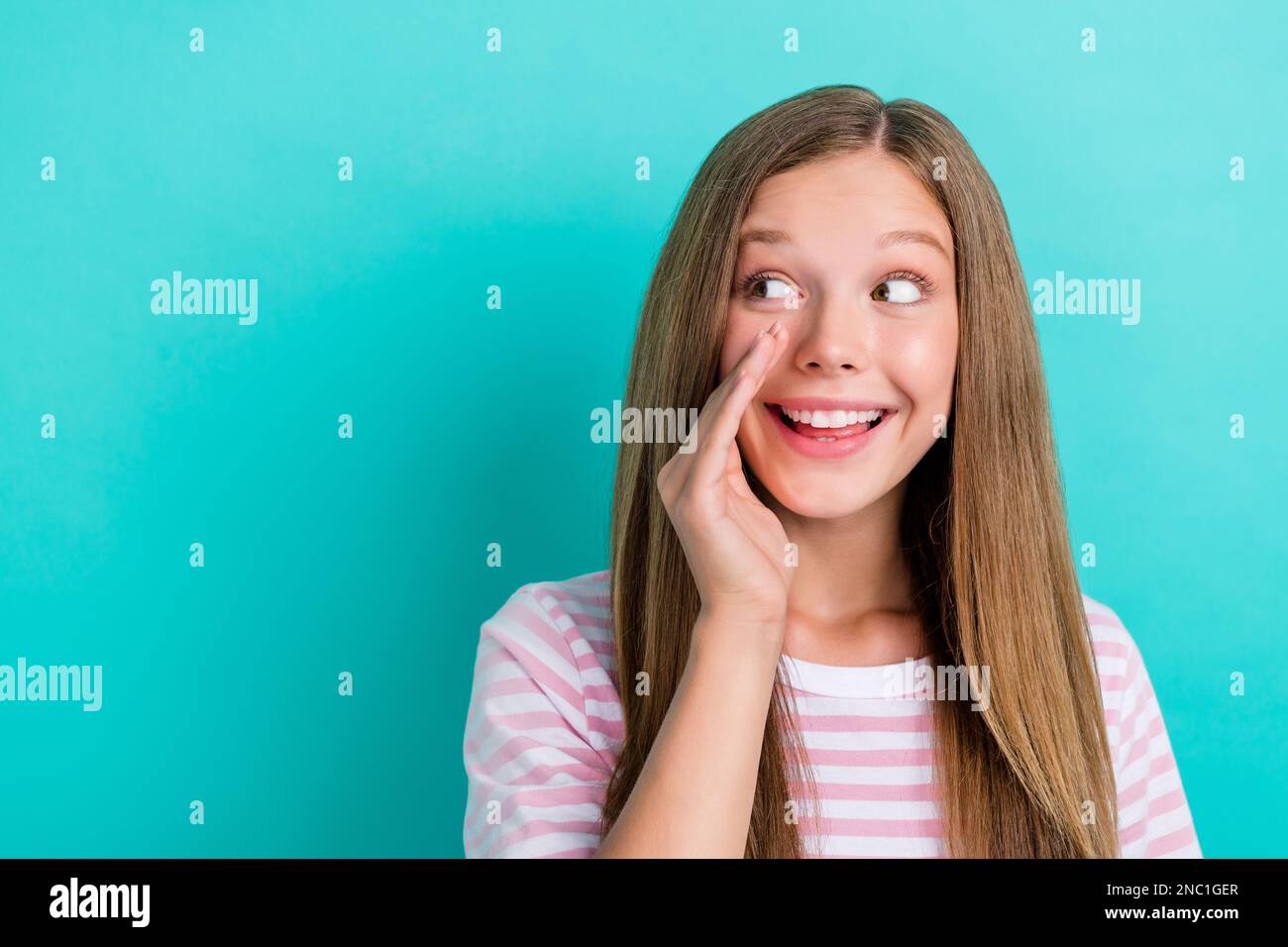 Photo of tricky cunning lady wear striped t-shirt arm mouth telling ...