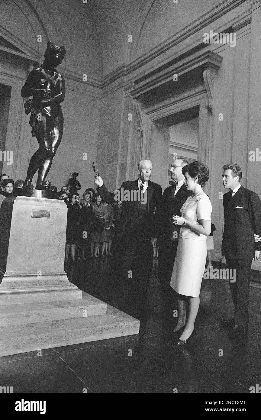 Princess Margaret and her husband, Lord Snowdon, pause to inspect a ...