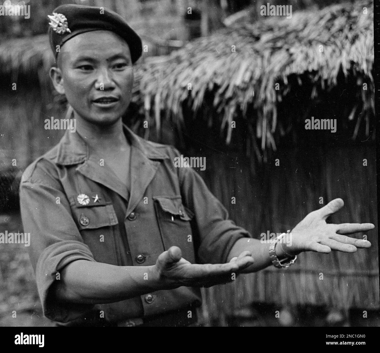 Lt. Col. Vang Pao talking to press at his mountain headquarter on May ...