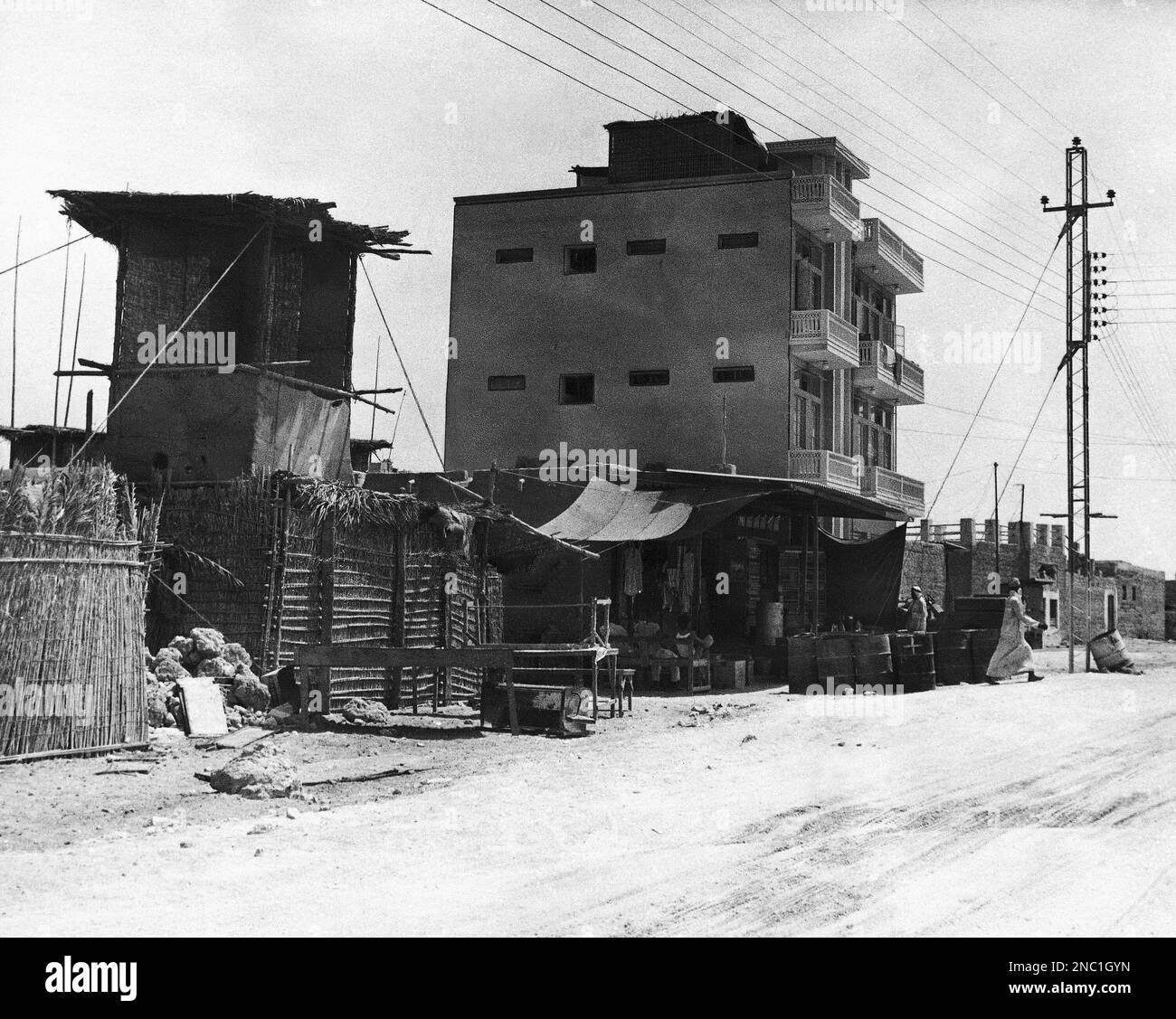 Tumbledown shacks on this main street in the town of Dubai on August 4 ...