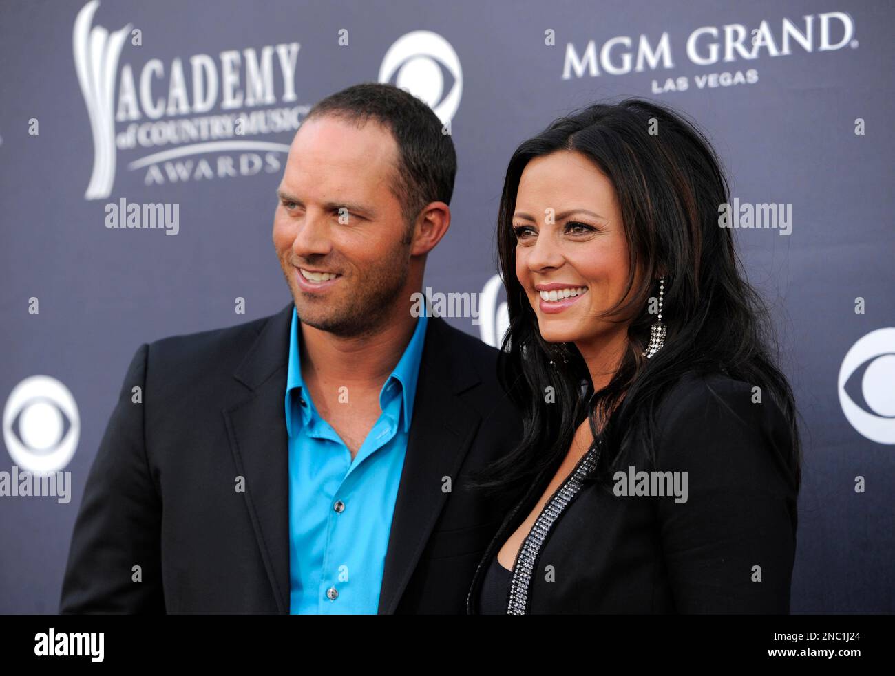 Jay Barker, left, and Sara Evans arrives at the 46th Annual Academy of ...