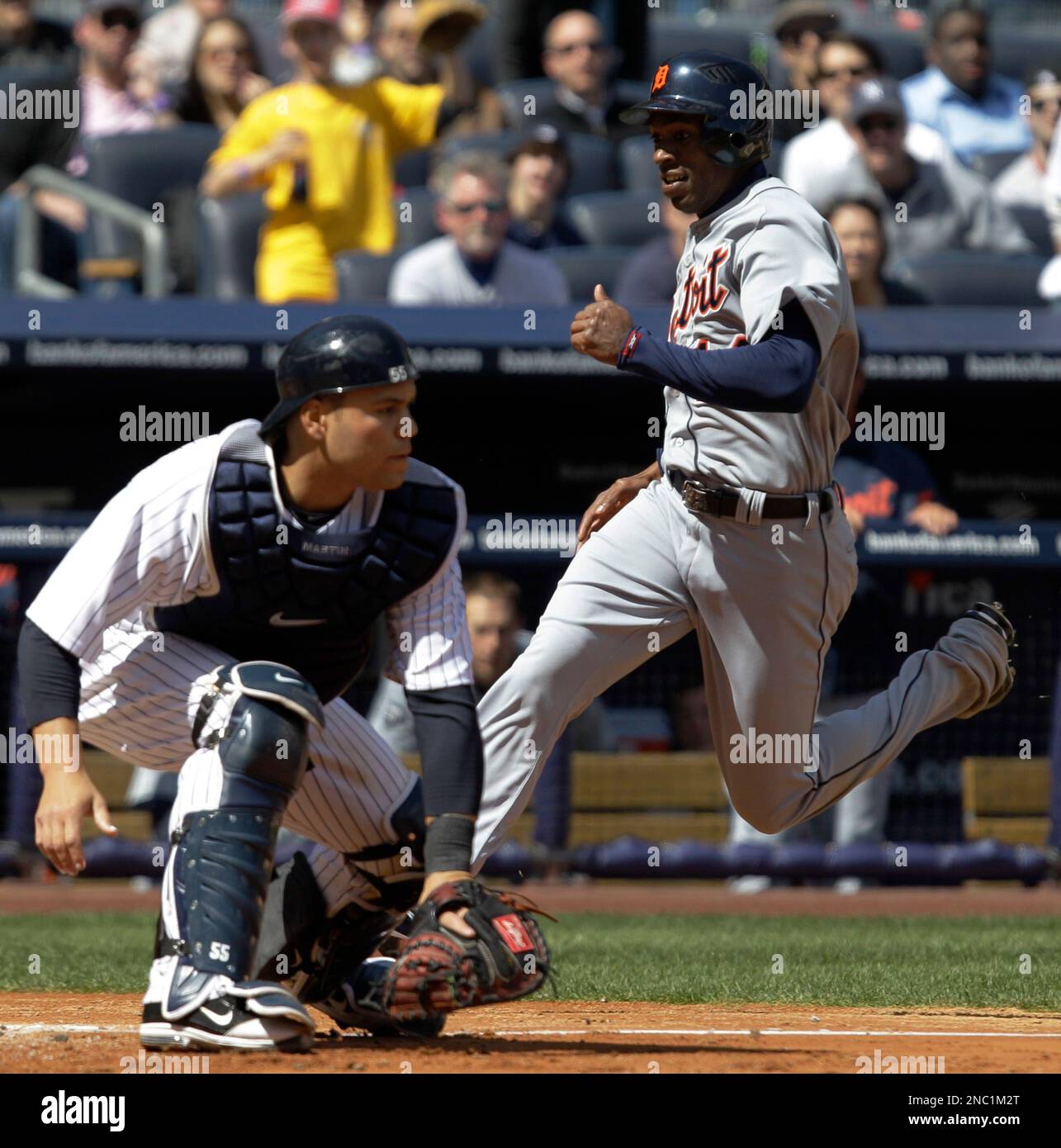 Detroit Tigers' Austin Jackson, right, scores on Brennan Boesch's third ...