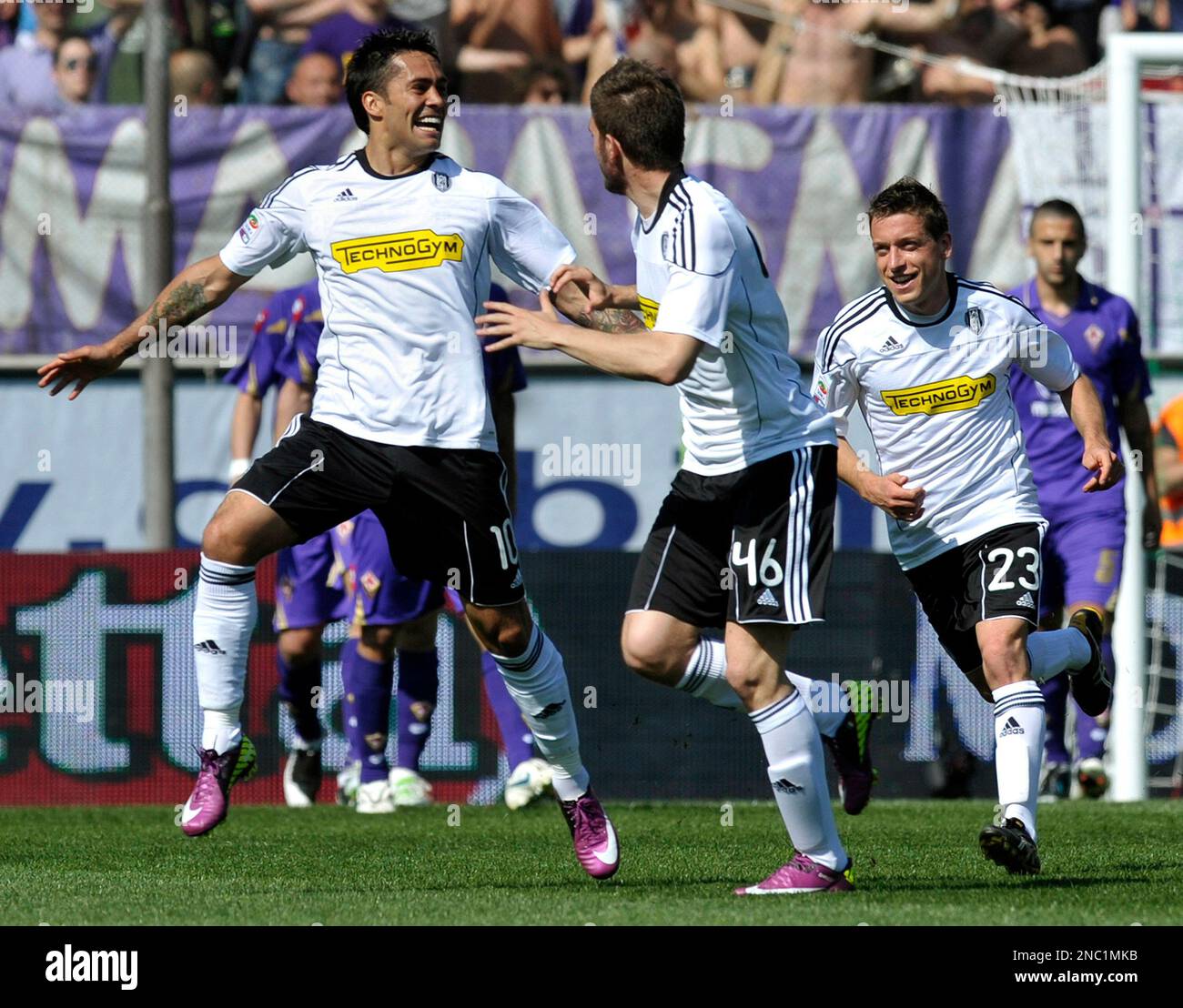 Cesena's Luis Jimenez of Chile, left celebrates with his teammate ...