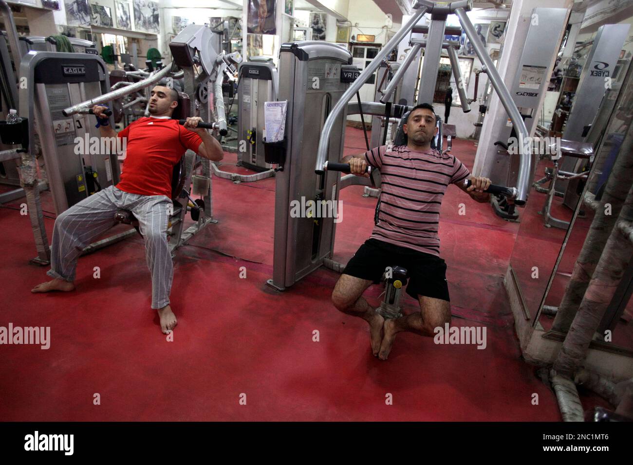 Men train at the Arnold Gym in central Baghdad, Iraq, Sunday, April 3 ...