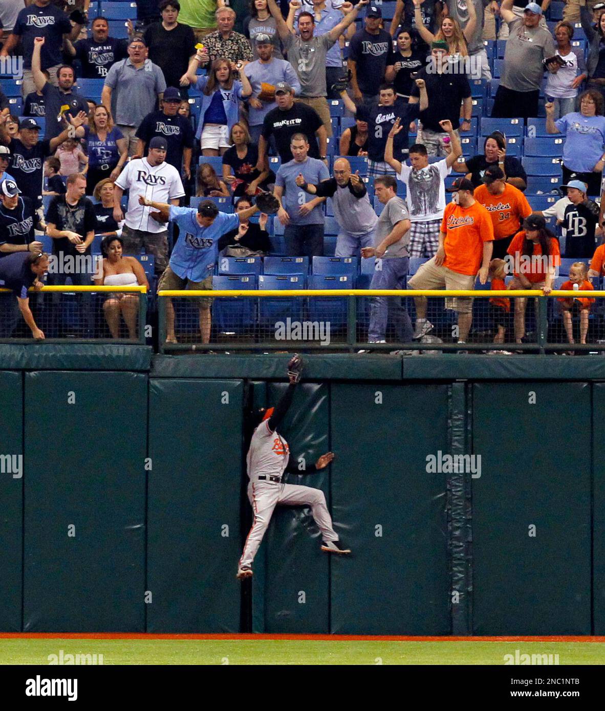 Baltimore Orioles' Nick Markakis makes a leaping catch on a hit by ...