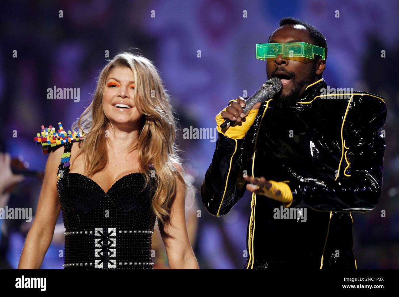 Fergie, left, and Will.i.am of the Black Eyed Peas perform at ...