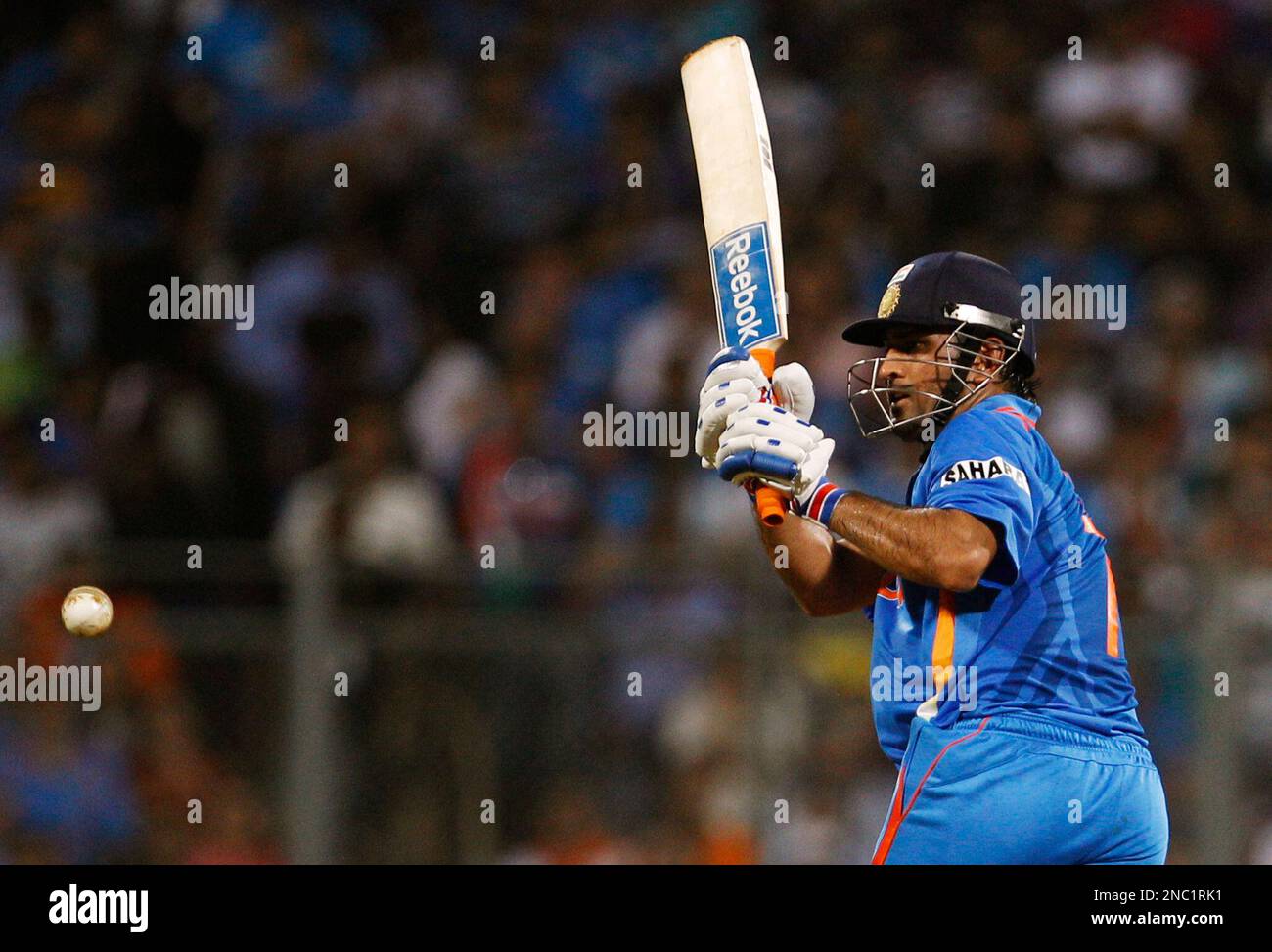 India's captain Mahendra Singh Dhoni plays a shot during the Cricket ...