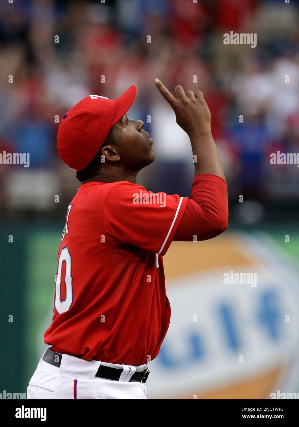 Texas Rangers closer Neftali Feliz points skyward after getting the ...