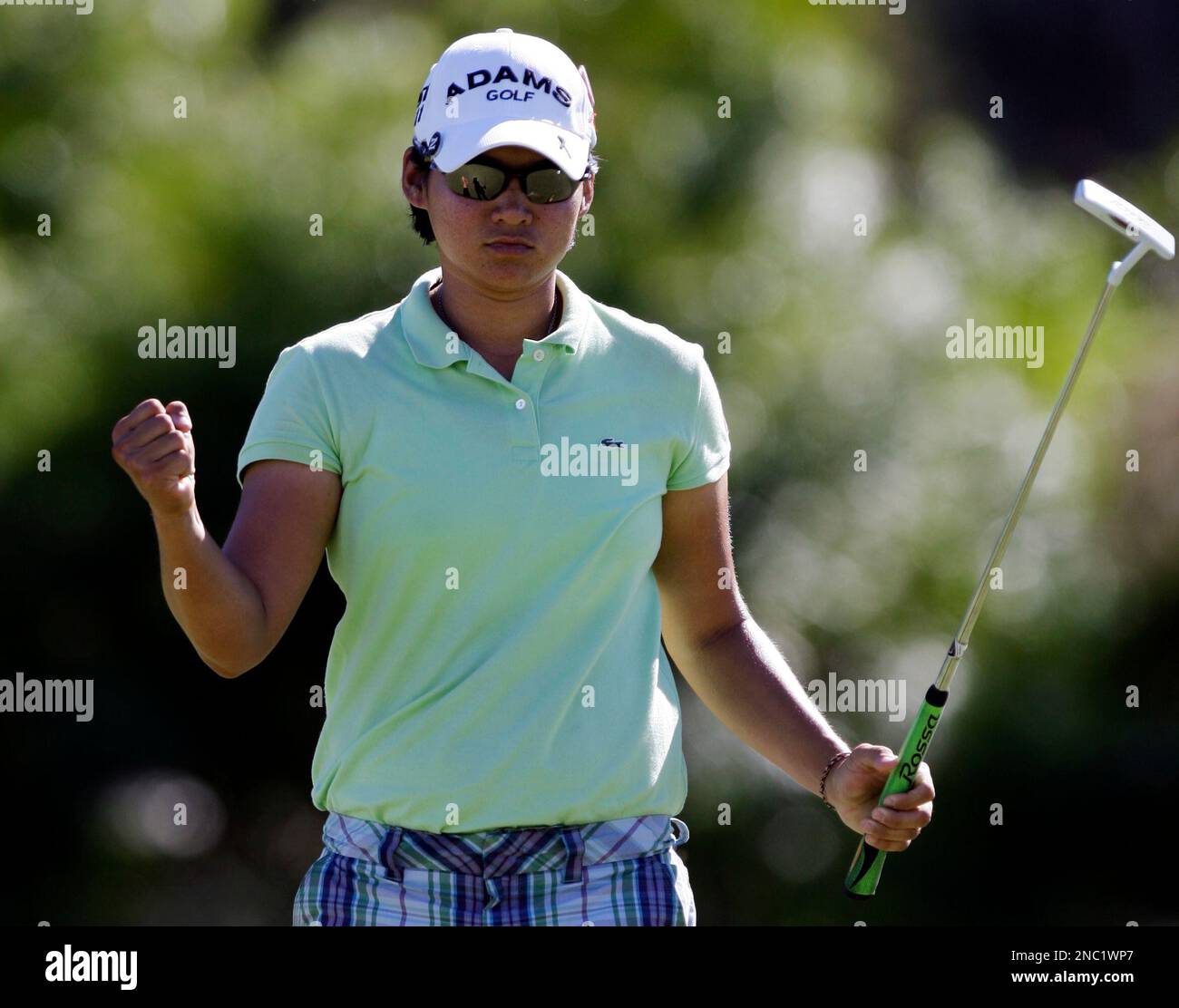 Defending champion Yani Tseng, of Taiwan, celebrates making birdie on ...