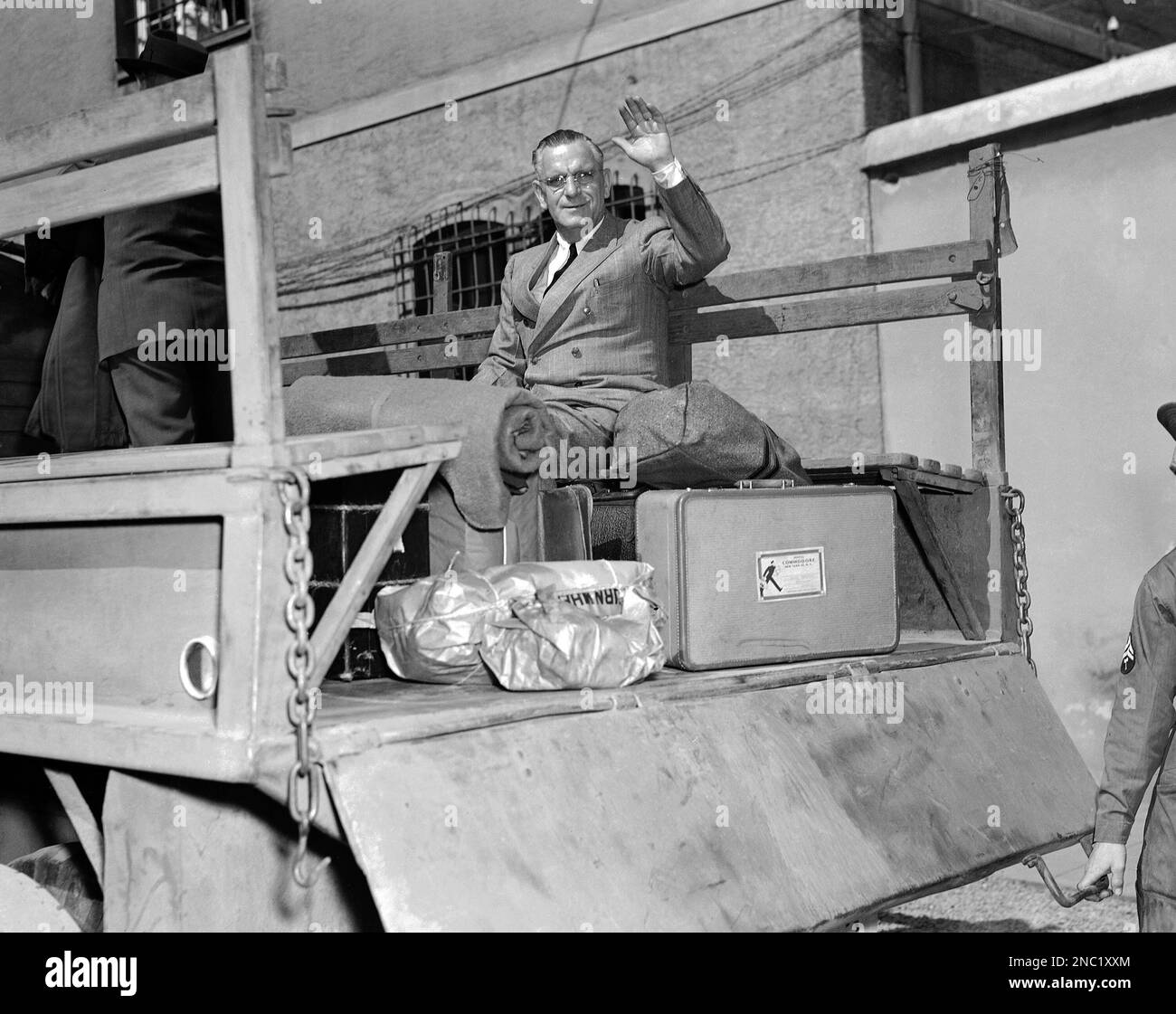 Fritz Julius Kuhn, former Fuehrer of German-American Bund, waves to ...
