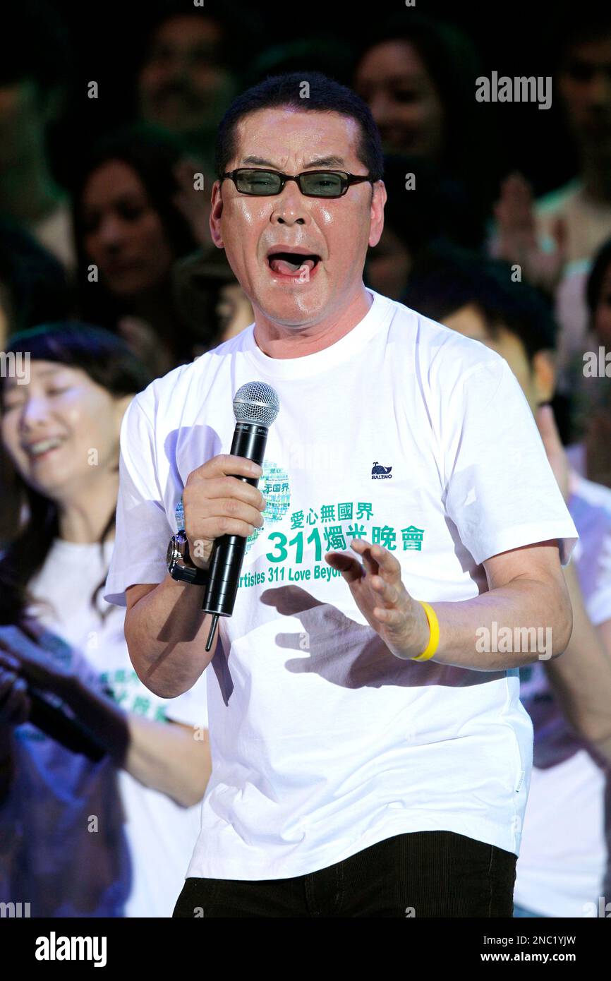 Japanese singer Masao Sen performs during the concert "Artistes 311 ...
