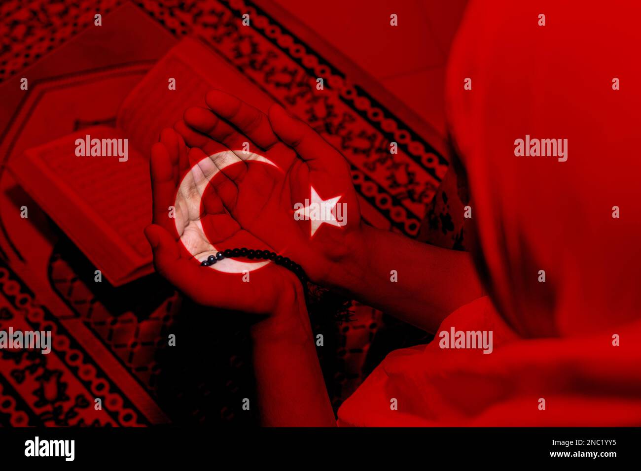 A Muslim woman raises her hands to pray. Support and prayers for ...