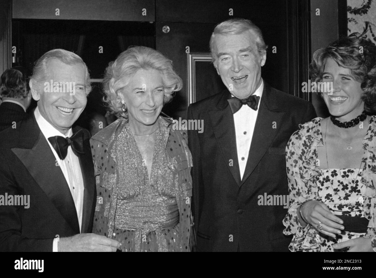 Actor Jimmy Stewart and his wife Gloria, center, share a laugh with ...