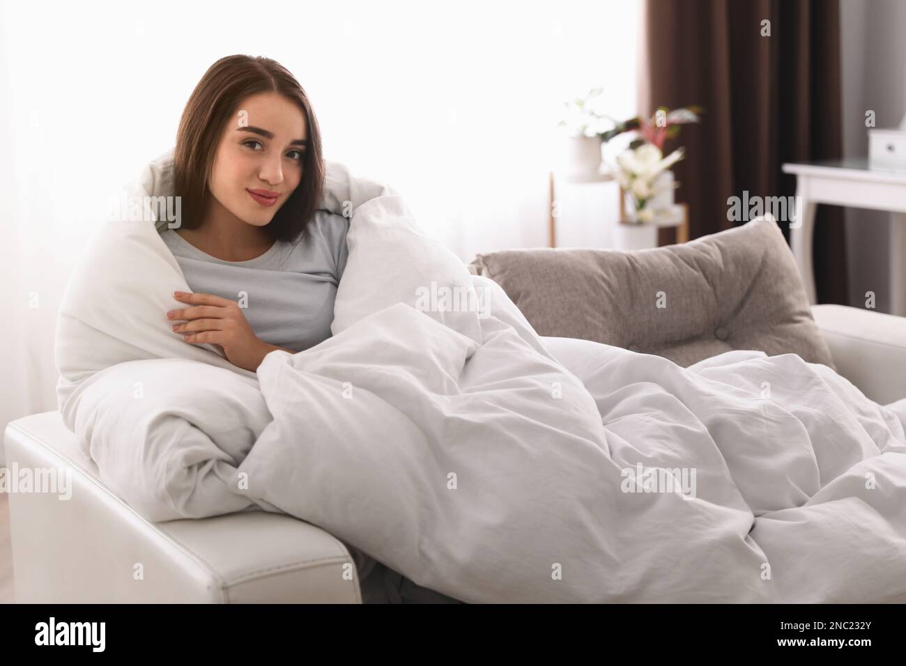Wrapped in duvet sofa hi-res stock photography and images - Alamy