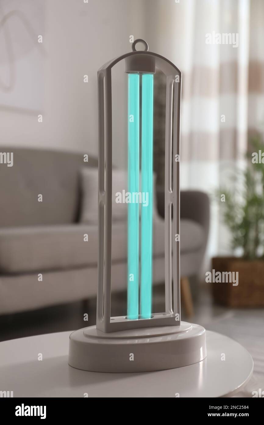 UV lamp for light sterilization on table in living room Stock Photo - Alamy
