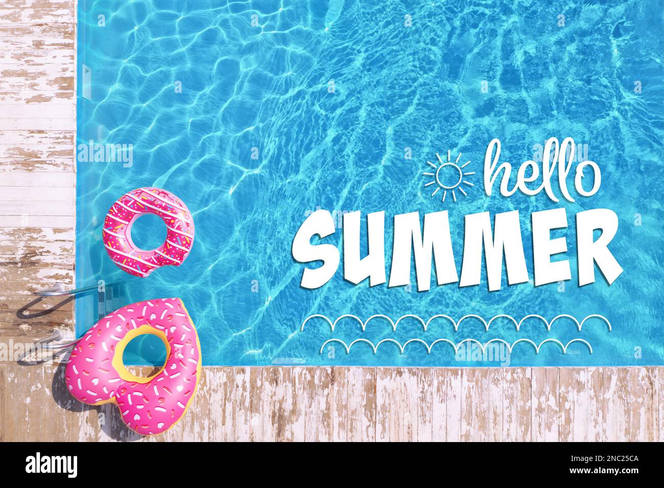 Hello Summer. Swimming pool with inflatable rings, top view Stock Photo ...