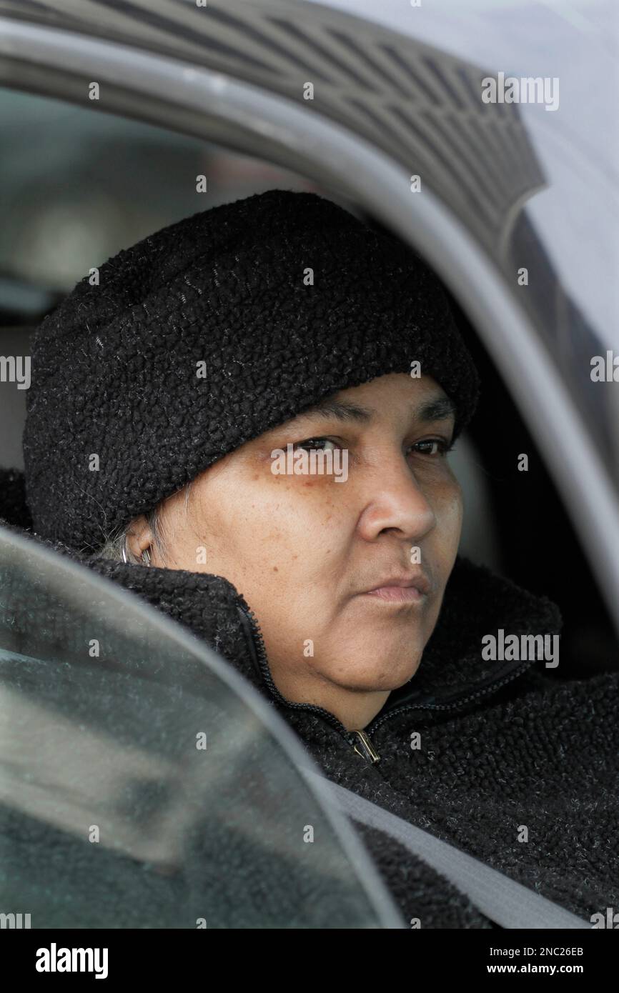 Neighborhood resident Carol Steele watches as demolition begins at the ...