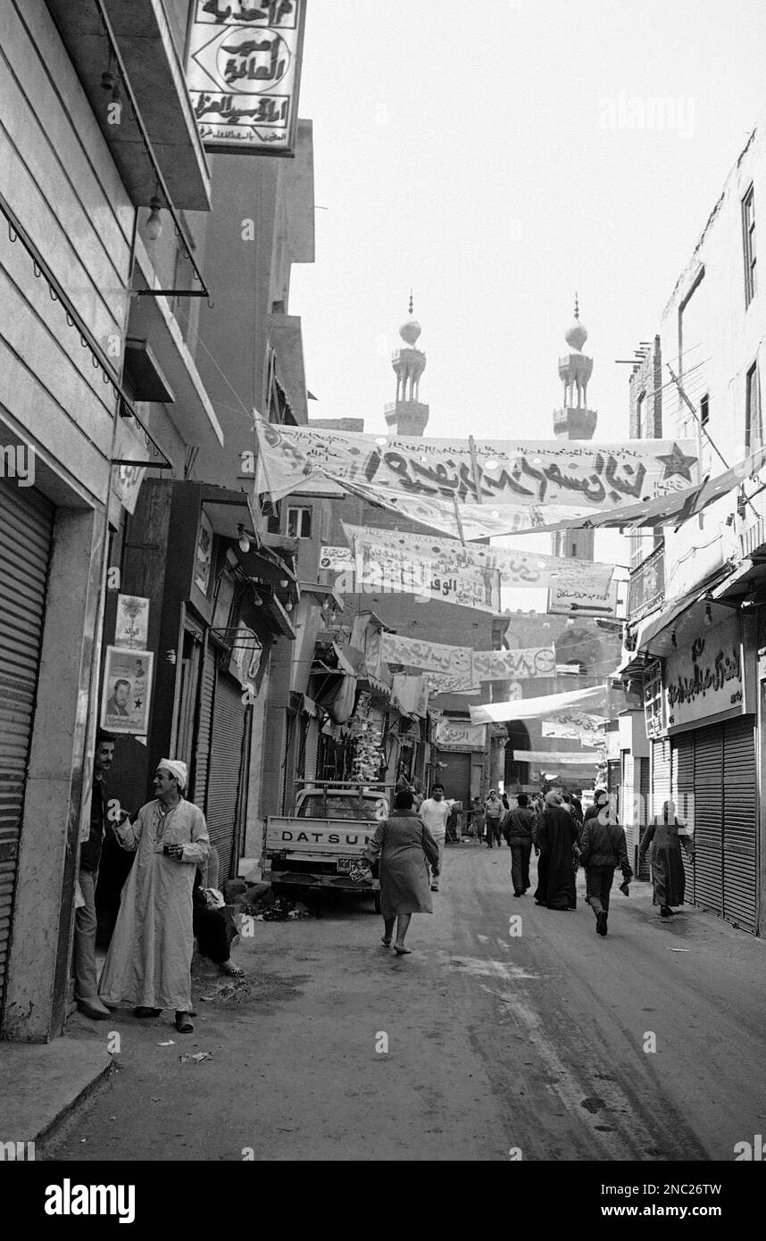 Election campaign streamers strung across a small street in old Cairo ...