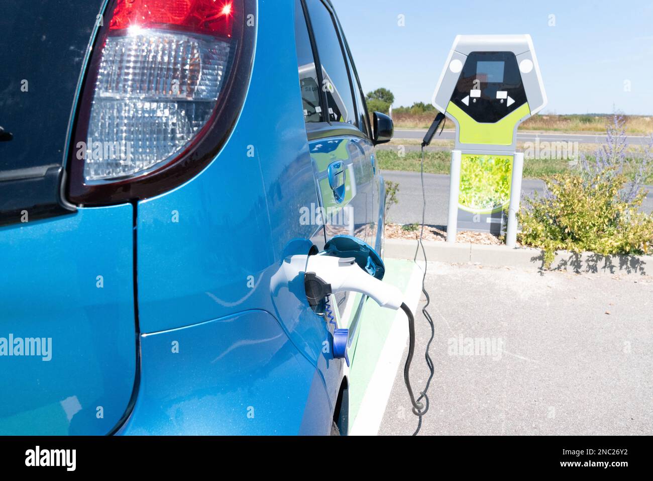 Electric car charging power supply station Stock Photo - Alamy