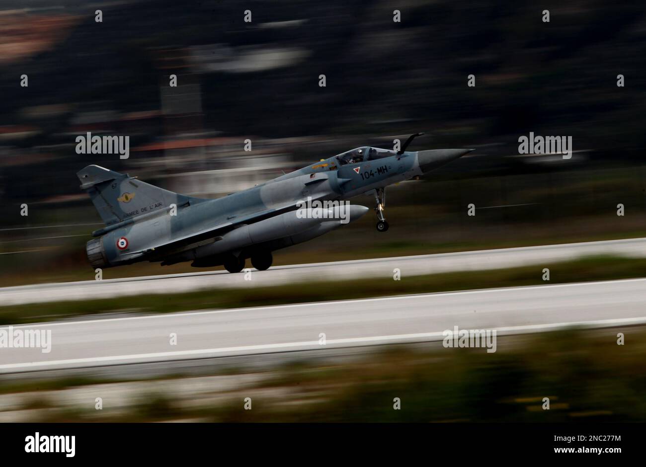 A French Air Force Mirage 2000 jet fighter takes off for a mission to ...