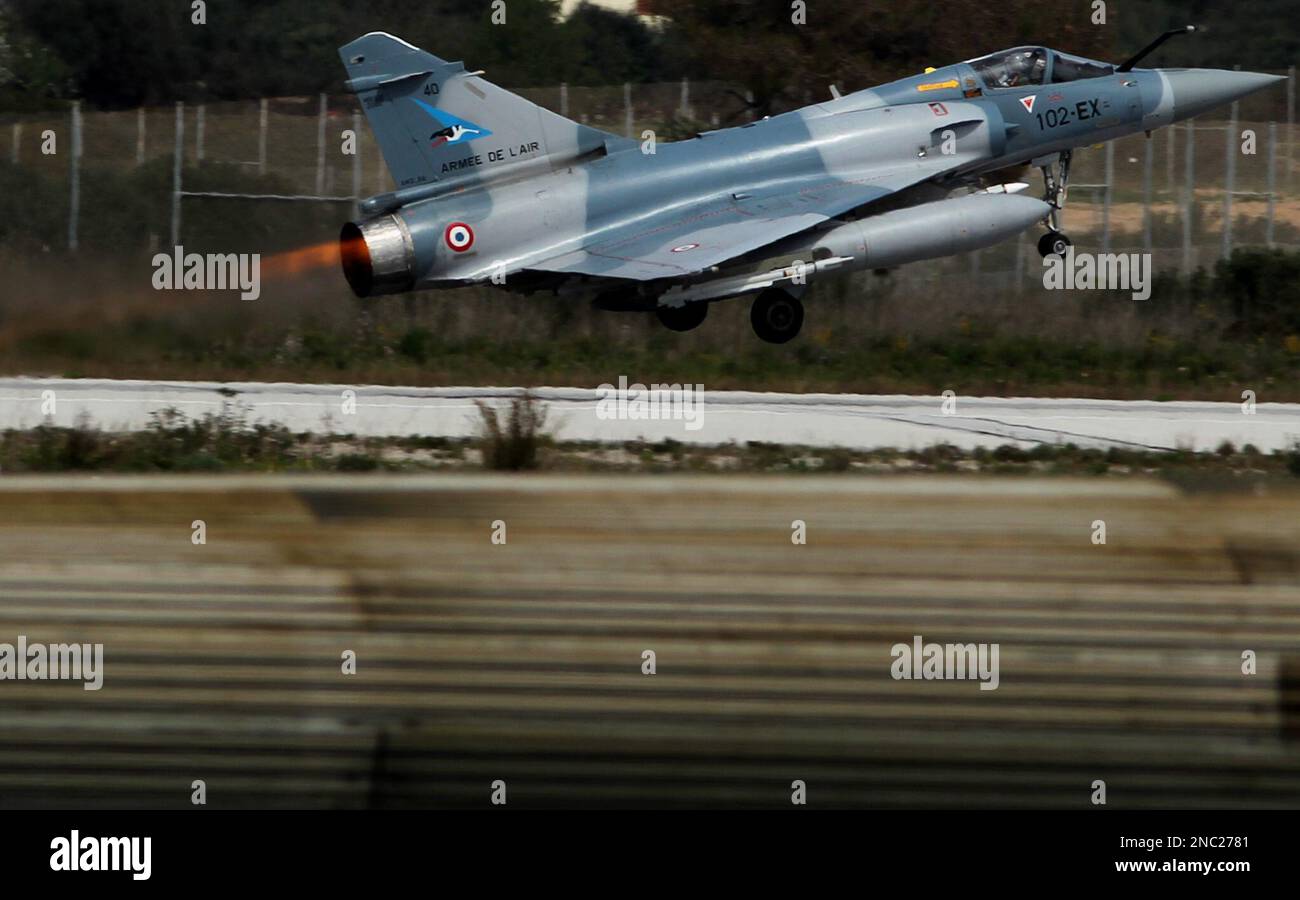 A French Air Force Mirage 2000 jet fighter takes off for a mission to ...