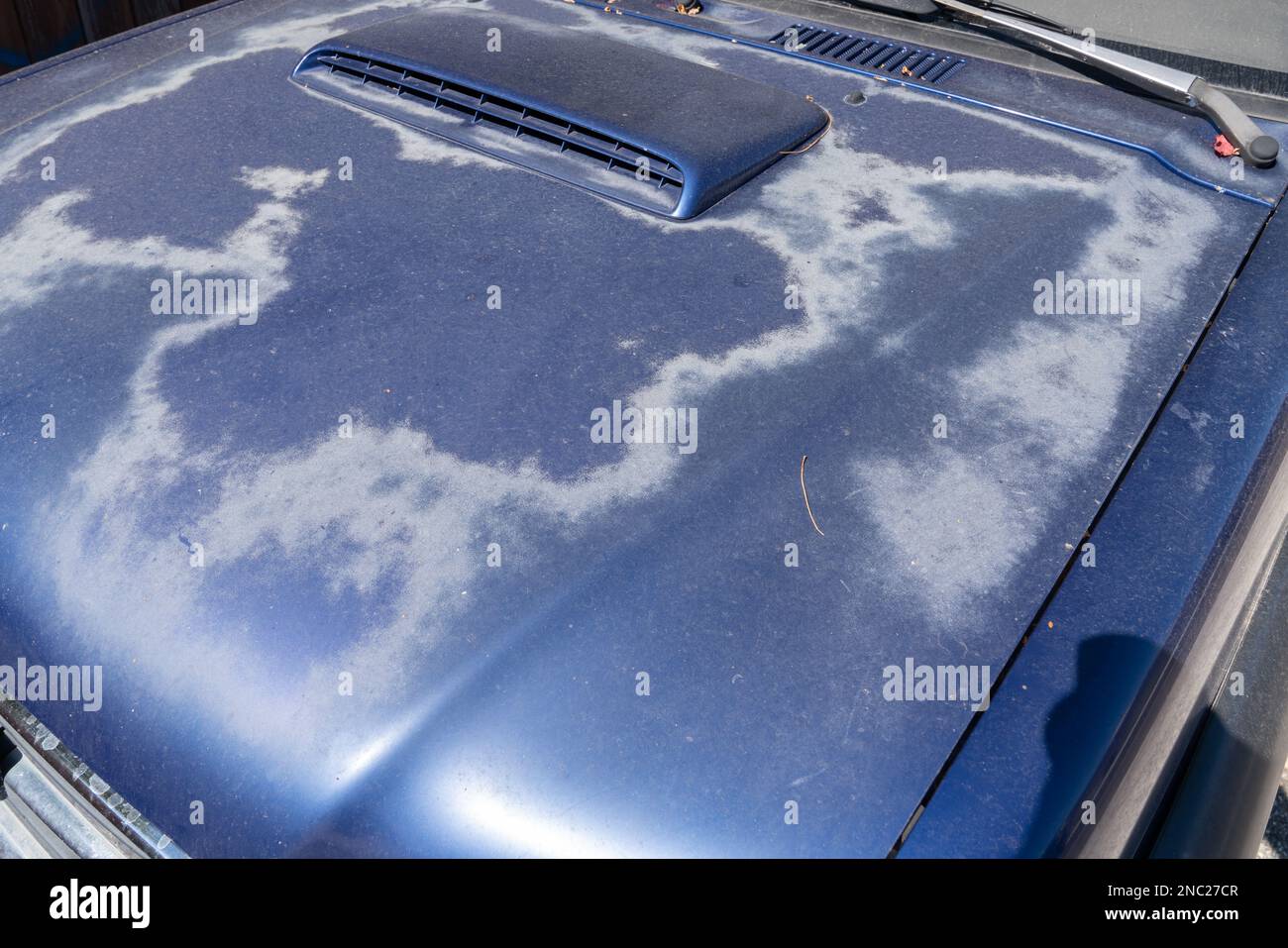 Peeling worn and cracked paint with scratches car by sun moon weather ...