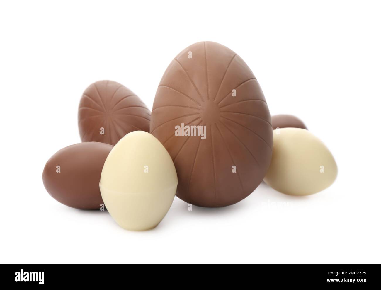 Many sweet chocolate eggs on white background Stock Photo - Alamy