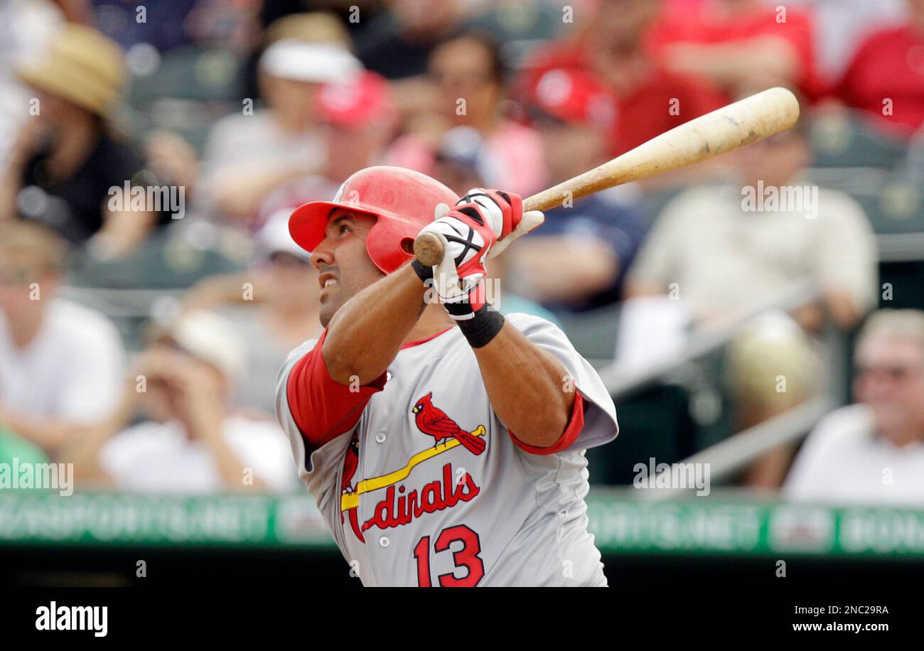St. Louis Cardinals catcher Gerald Laird (13) bats during a spring ...