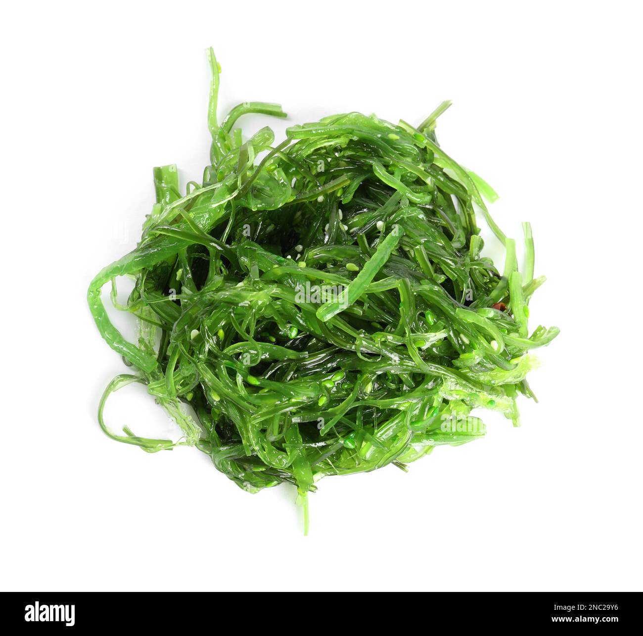 Delicious seaweed salad on white background, top view Stock Photo - Alamy