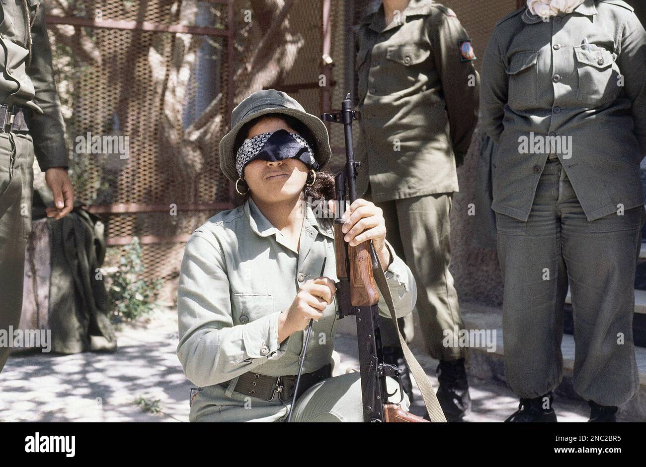 A contingent of Libyan women soldiers undergo Guerrilla training at a ...