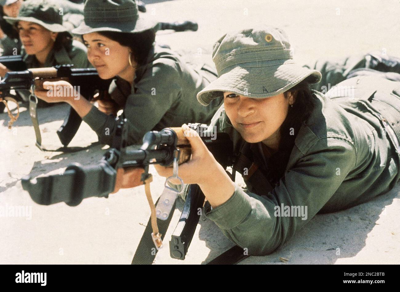 A contingent of Libyan women soldiers undergo Guerrilla training at a ...