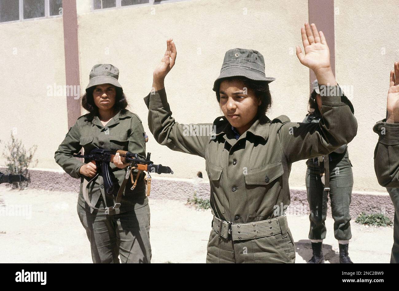 A contingent of Libyan women soldiers undergo Guerrilla training at a barracks in Tripoli, Libya ...
