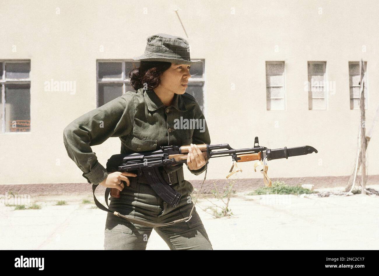 A contingent of Libyan women soldiers undergo Guerrilla training at a ...